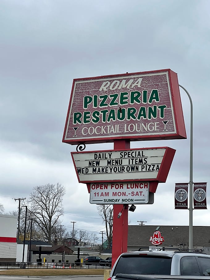 Roma's vintage sign promises daily specials and Wednesday pizza creativity – a midweek bright spot.