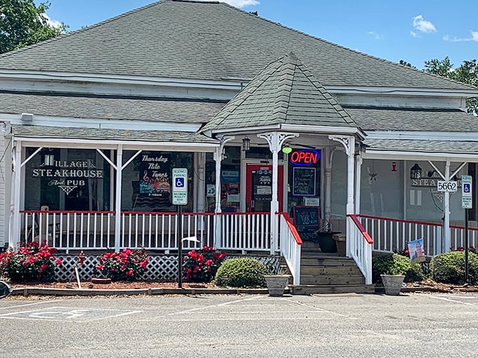 Village Steakhouse's charming cottage exterior feels like it should be in a fairy tale—"Goldilocks and the Three Bears Who Knew How to Cook a Perfect Steak."