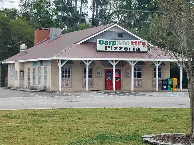 The cream walls and red doors of Carpenetti's create a storybook setting for pizza that's anything but a fairy tale—it's deliciously real.