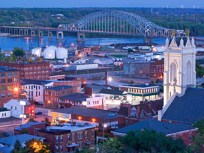 This stunning twilight view showcases Dubuque, Iowa, with its beautiful cityscape along the Mississippi River.