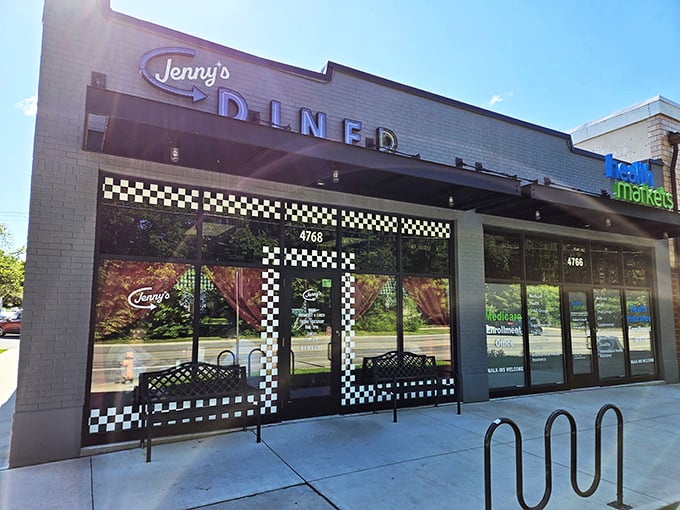 The black and white checkerboard pattern isn't just decoration—it's a promise that traditional diner goodness awaits inside.