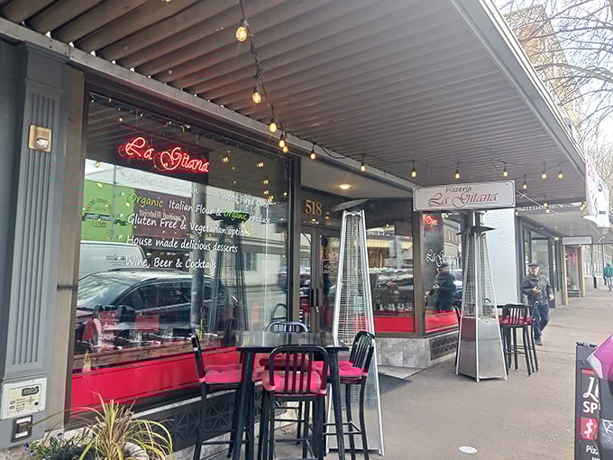 La Gitana's sidewalk seating invites you to linger over one more glass of wine and maybe, just maybe, another slice of that wood-fired perfection.
