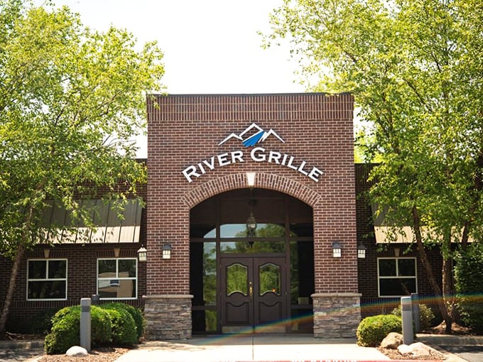 Sunlight bathes River Grille's welcoming entrance – a portal to some of Bentonville's most celebrated steaks.