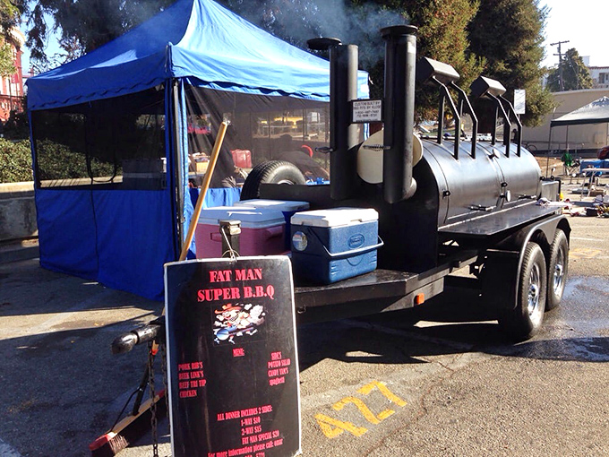 The "Fat Man Super BBQ" smoker—where patience transforms into flavor and the aroma alone is worth the trip. Vegetarians, consider yourselves warned!