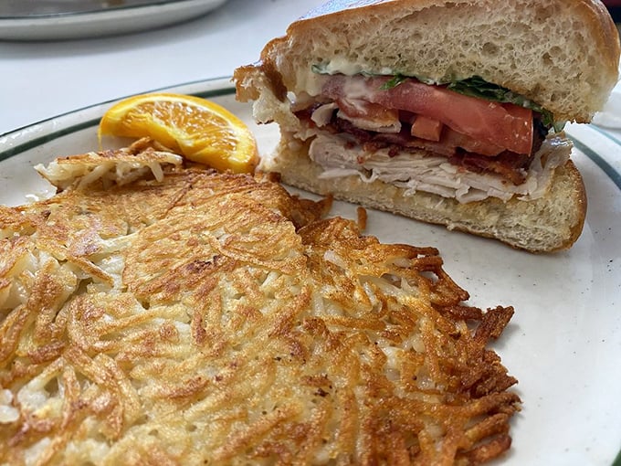 This sandwich isn't just stacked with turkey, bacon and fresh veggies—it's built on the foundation of that famous homemade bread. Game changer.