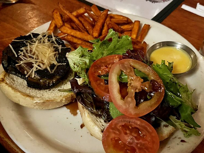 Open-faced and unabashed, this burger doesn't hide its delicious intentions. The sweet potato fries are just showing off at this point.