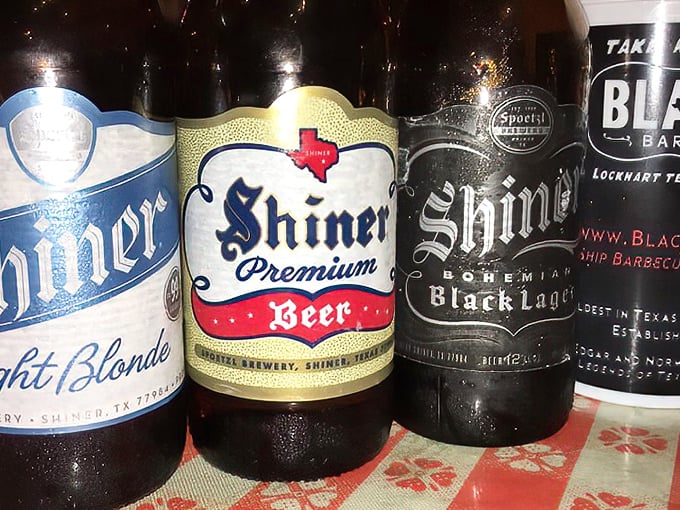 Texas philosophy in liquid form: Shiner Beer alongside Black's BBQ—a pairing as natural and necessary as boots with jeans.