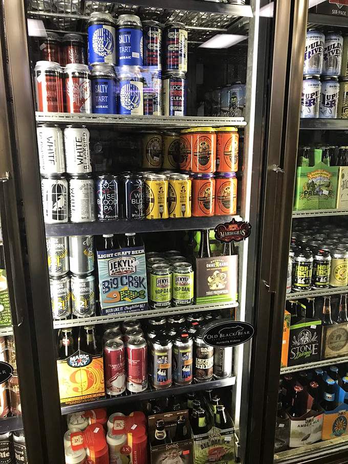The beer selection rivals many dedicated bars. These refrigerated cases hold liquid treasures from around the world, proving diplomacy extends to beverages too.