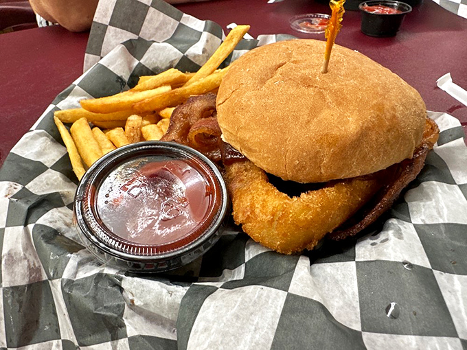 The Big Tex burger doesn't just satisfy hunger—it obliterates it with bacon, onion rings, and BBQ sauce in perfect harmony.