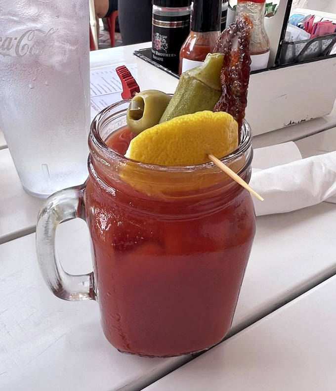 This Bloody Mary isn't just a drink – it's a garden party in a glass with enough garnishes to count as a small appetizer.