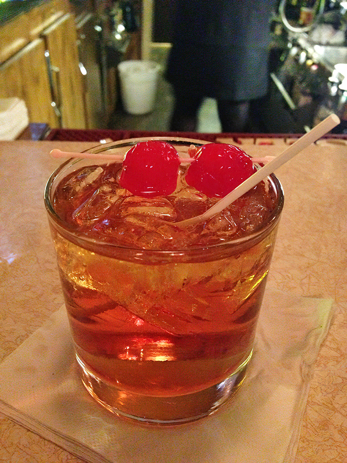 Wisconsin's unofficial state cocktail – the Brandy Old Fashioned Sweet – garnished with cherries that have witnessed countless local celebrations.