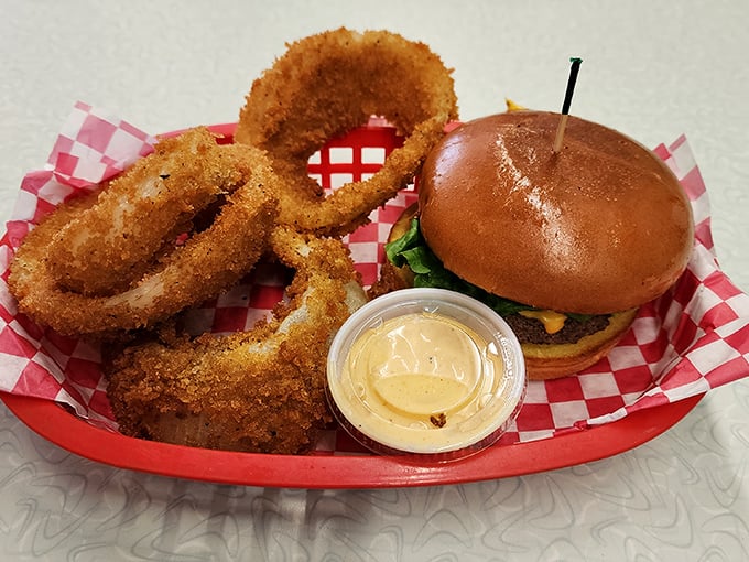 This burger and onion rings basket doesn't need filters or fancy plating—it's the taste equivalent of your favorite broken-in jeans and concert t-shirt.