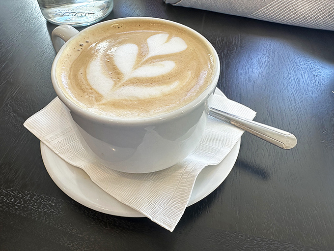 Latte art isn't just pretty—it's a promise. This cappuccino delivers with velvety microfoam that's the coffee equivalent of a perfect pillow.