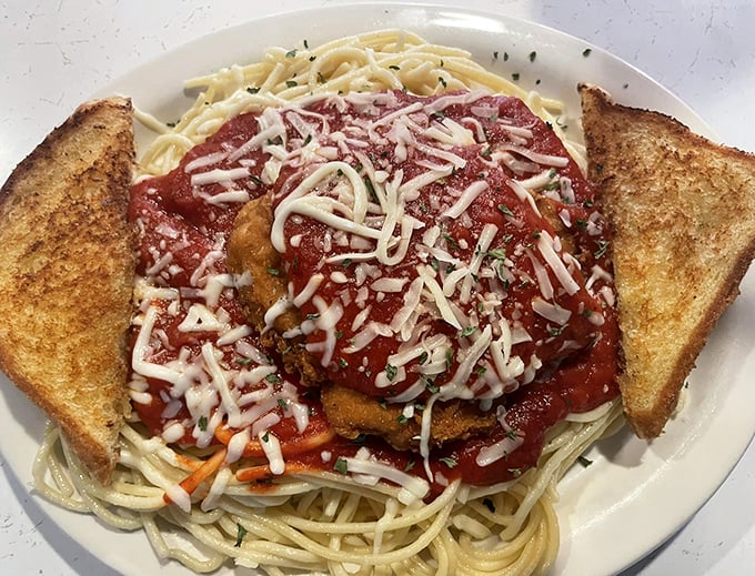 This chicken parmesan isn't trying to be Italian – it's proudly Ohioan, with enough sauce and cheese to require a post-meal nap.