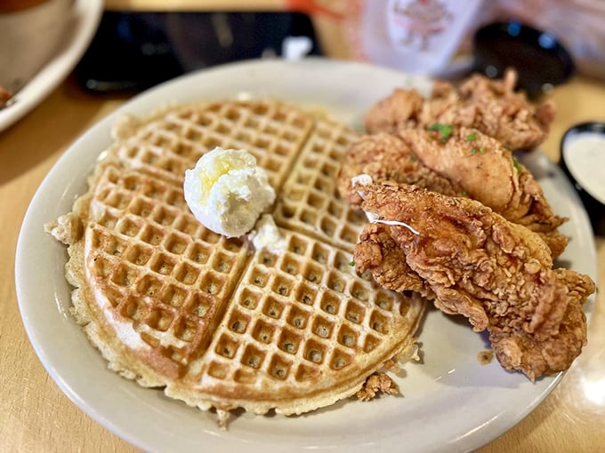 The signature chicken and waffles—a sweet and savory romance that proves some of the best relationships are the ones that don't make sense on paper.