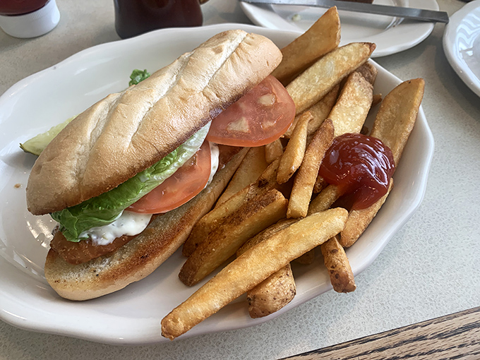 Simplicity executed perfectly—crispy golden bread, fresh veggies, and hand-cut fries that make you wonder why you ever eat frozen ones.