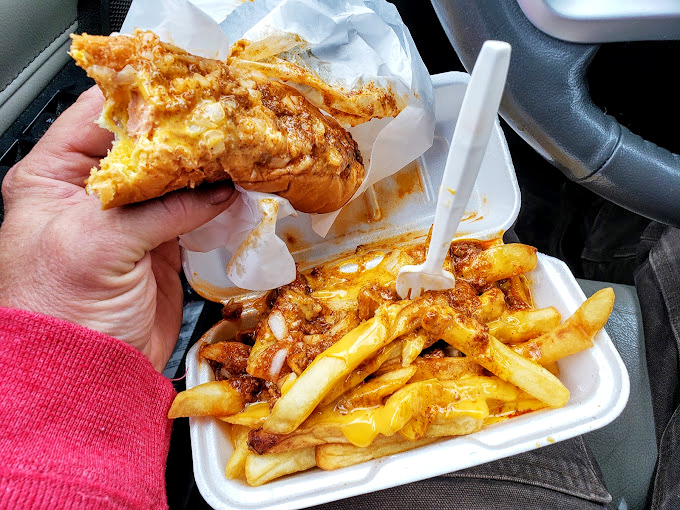 A feast fit for royalty served in a humble paper container. The chili cheese combo that's worth every napkin you'll need.
