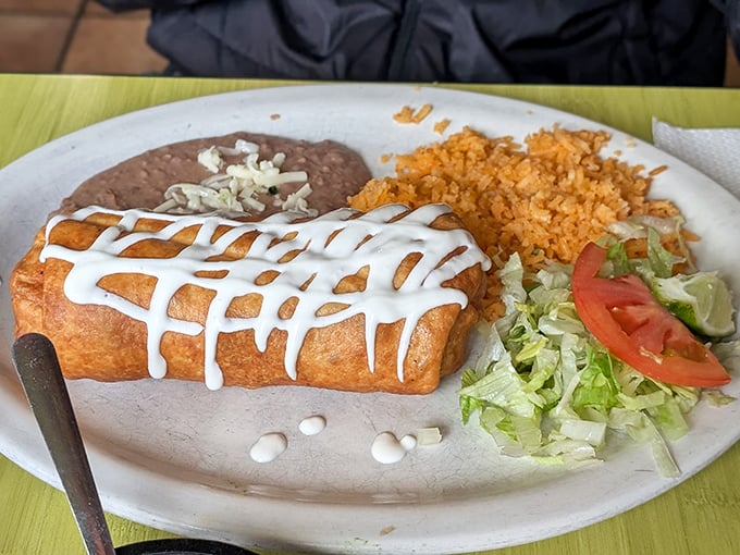 Golden-fried perfection drizzled with sour cream – this chimichanga has the satisfying crunch that makes you close your eyes with each bite.