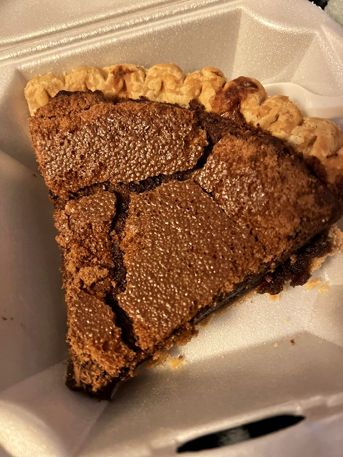Chocolate chess pie with that signature crackly top—like a brownie and custard had a beautiful Southern baby.