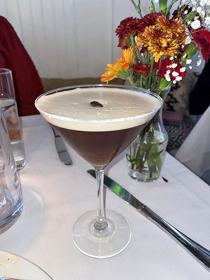 This isn't just a martini—it's dessert wearing evening attire. The coffee bean garnish is like the perfect punctuation mark.