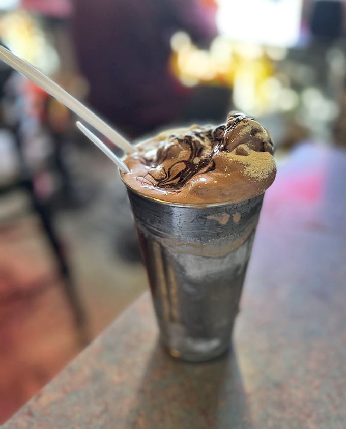 This chocolate malt isn't just dessert, it's a time machine – one spoonful and suddenly you're twelve years old again, plotting how to finish homework faster.