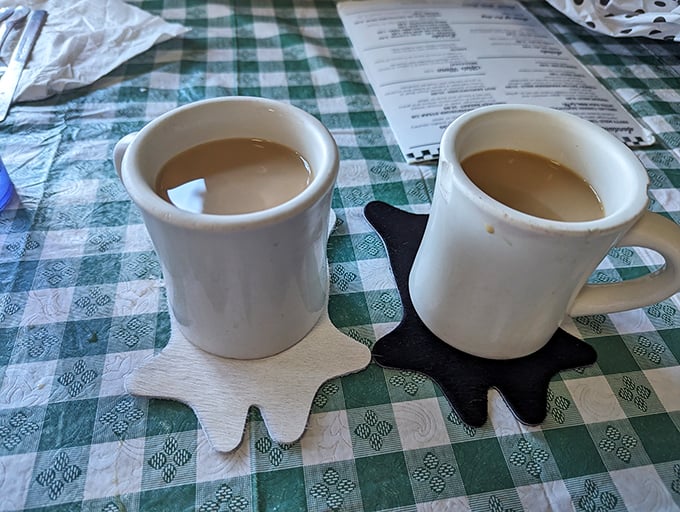 Two coffee mugs on star-shaped coasters—because even caffeine deserves a stage. In Nebraska, coffee isn't a beverage; it's a relationship.