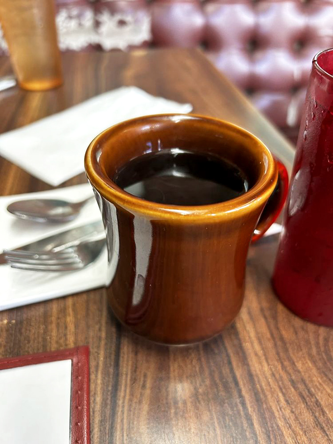The humble brown coffee mug—delivering liquid motivation since forever. At Rae's, it's not just coffee; it's a commitment to keeping the refills coming.