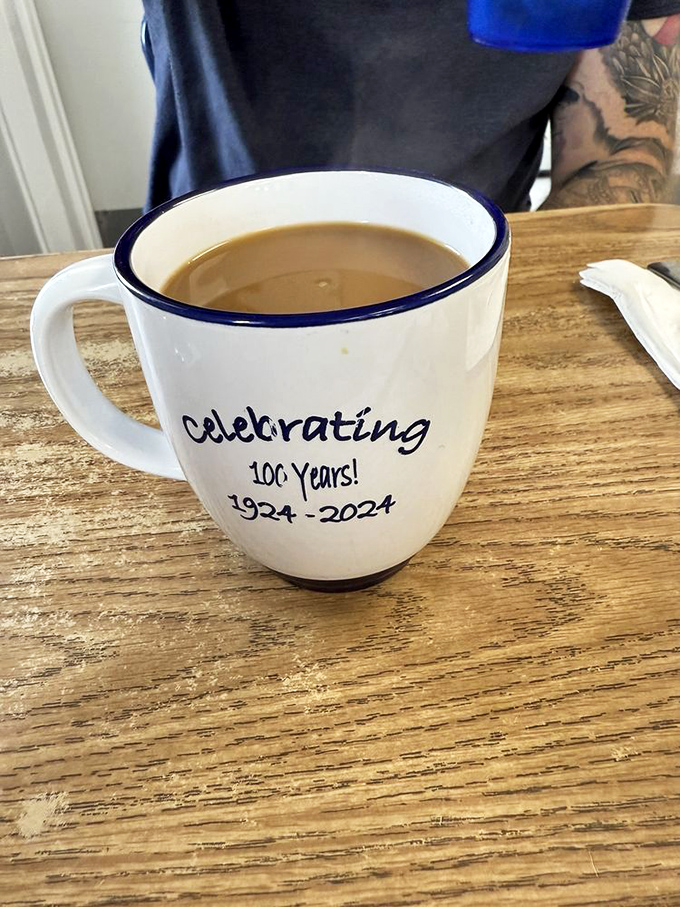 Their centennial celebration coffee mug tells a story of longevity—100 years of caffeinating the Delta, one perfect cup at a time.