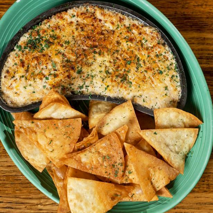 This bubbling crab dip is the social butterfly of appetizers—bringing people together one tortilla chip at a time.