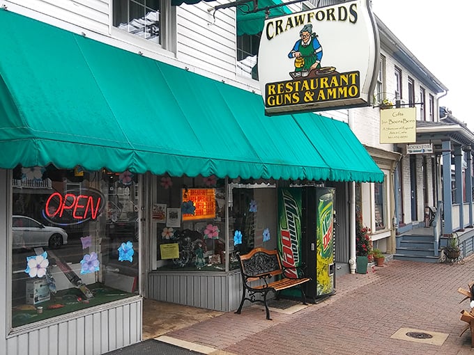 Crawford's unique "Restaurant, Guns & Ammo" sign perfectly captures small-town America's delightful quirks – where practical needs meet unexpected combinations.