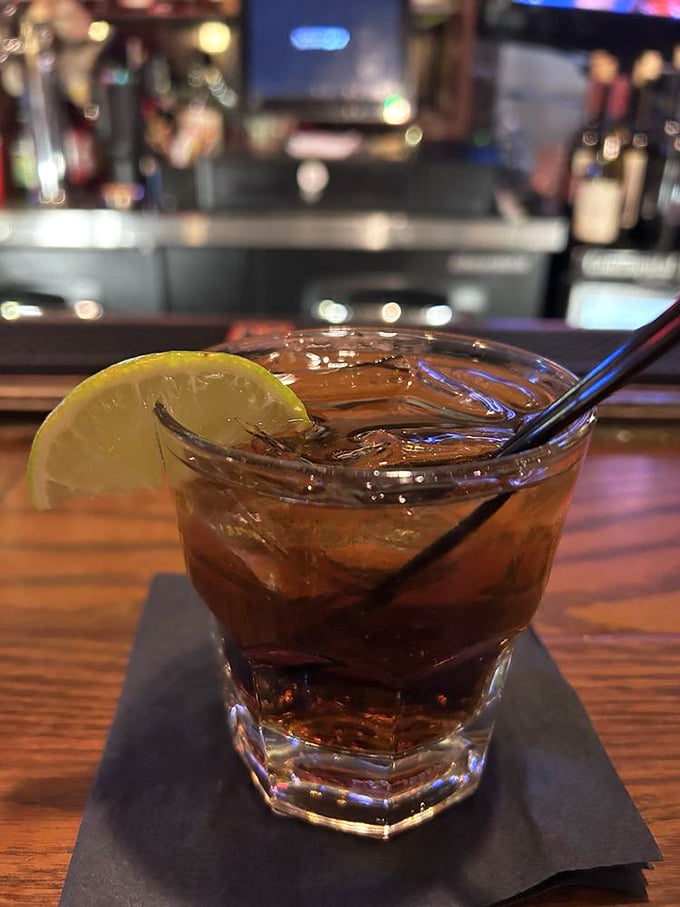 This isn't just a cocktail—it's liquid amber nostalgia in a glass, the kind Don Draper would order while plotting his next big campaign.