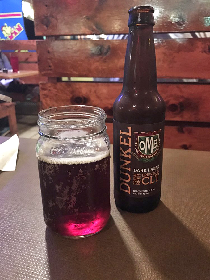 Local craft beer served in a mason jar—because sometimes the best things come in the most unpretentious packages.