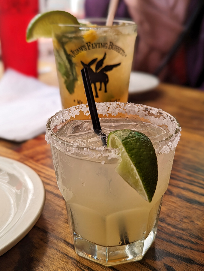 Their margaritas don't just complement the meal—they're supporting characters in your dining adventure, with salt rims crisp enough to hear from across the table.