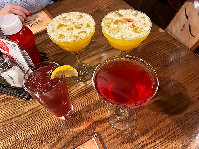 Cocktail hour done right—vibrant concoctions that promise good times ahead. That crimson beauty is calling my name louder than my cardiologist.