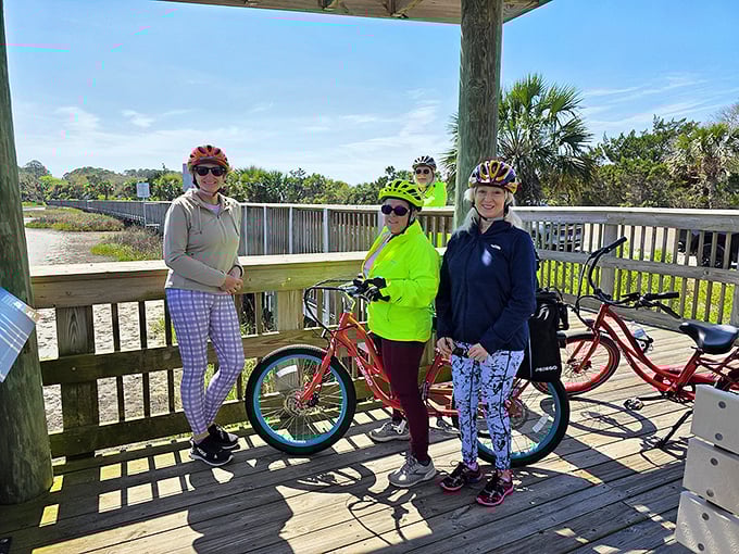 Biking Amelia Island's trails offers the perfect blend of exercise and sightseeing—the smiles suggest they're discovering hidden corners tourists in cars miss entirely.