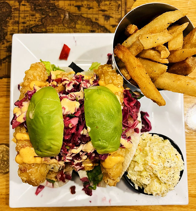 These fish tacos with vibrant slaw and avocado aren't just a meal—they're a beach vacation for your taste buds, no sunscreen required.