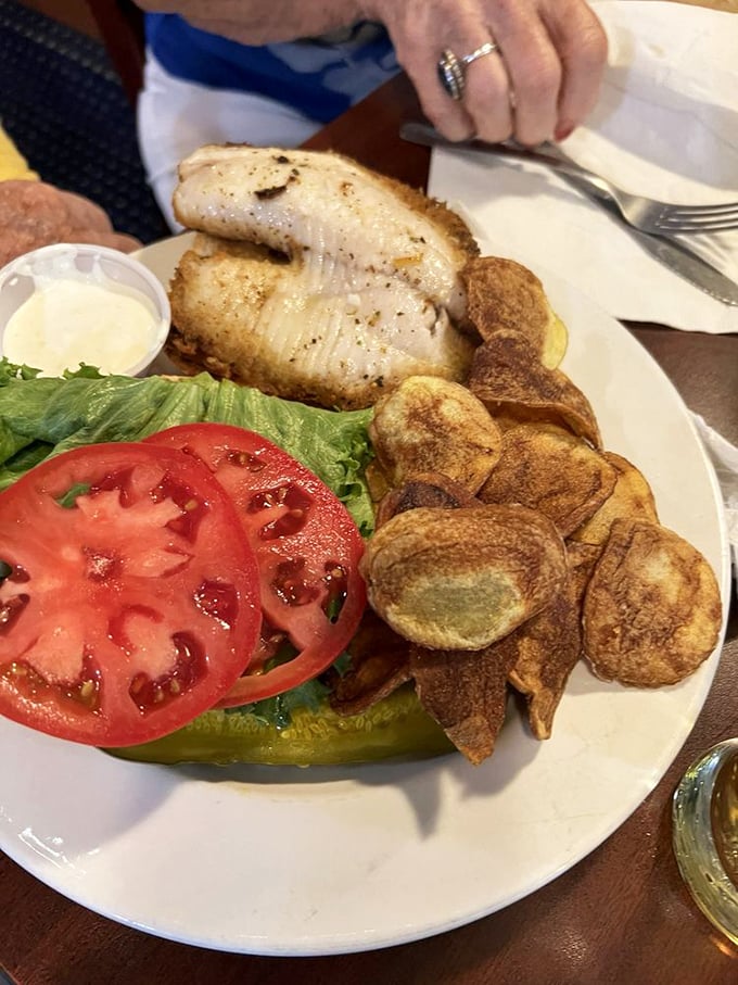 Ocean meets railroad in this fish sandwich that's swimming with flavor. The homemade chips aren't just along for the ride—they're co-conductors.