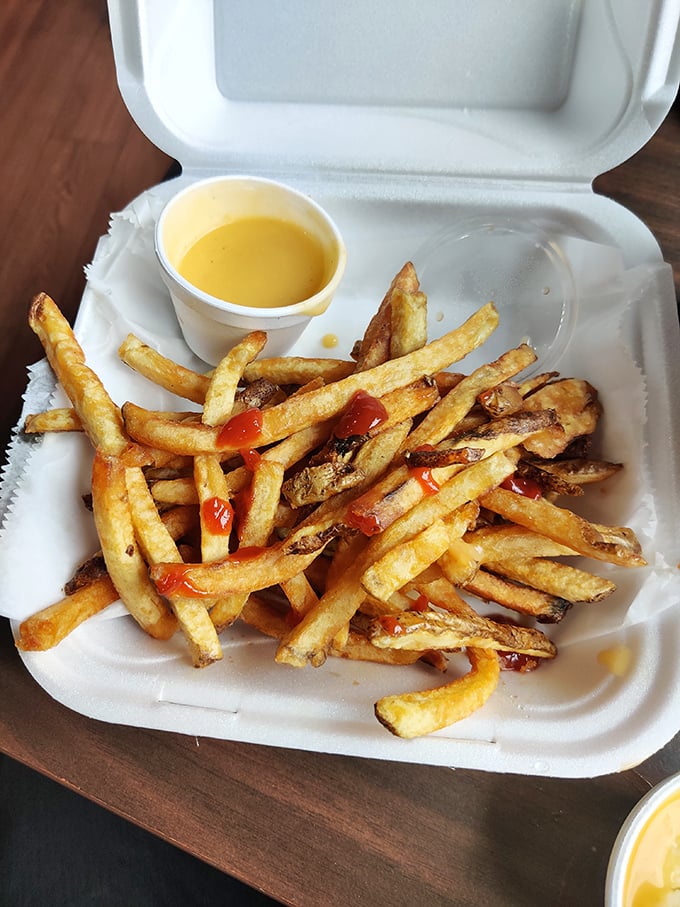 Hand-cut fries with personality—crispy edges, fluffy centers, and just enough imperfection to remind you that real humans made your food.