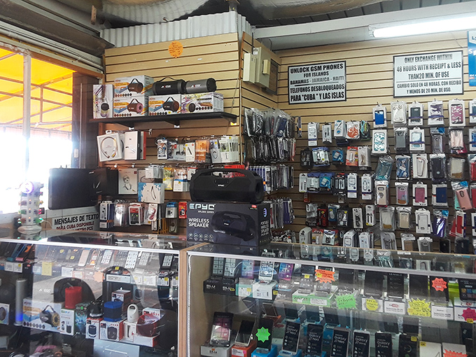 Technology's bazaar—where smartphone cases and gadgets create a mosaic of modern necessity behind glass counters that have seen a thousand haggling sessions.