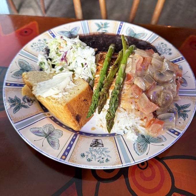 Fresh Mahi-Mahi perched atop a Caesar salad—proof that sometimes the simplest preparations let Florida's seafood shine brightest.