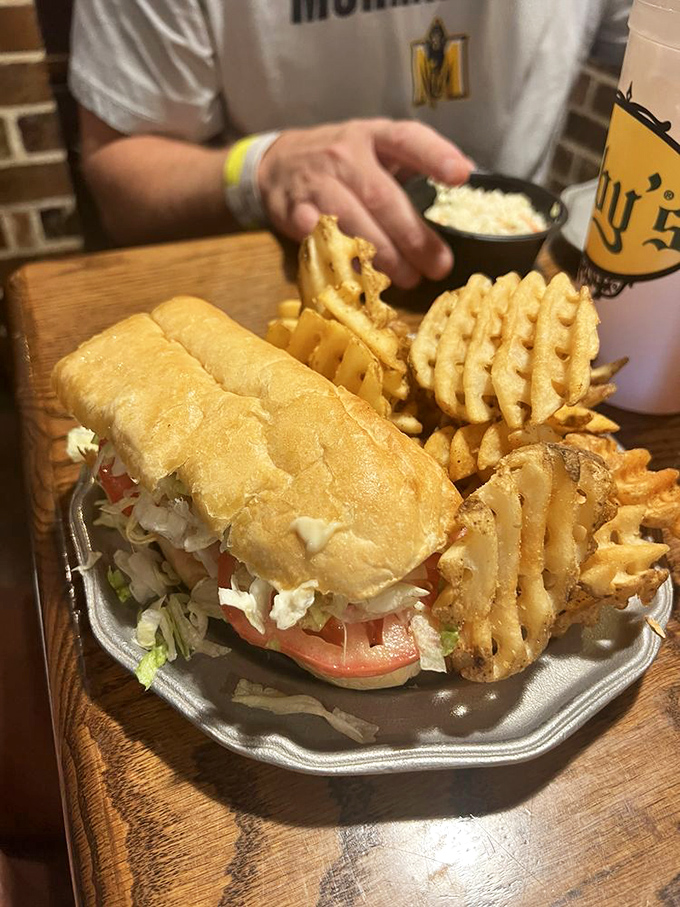This po-boy doesn't need to brag—the pillowy bread and generous fillings speak volumes about Oby's commitment to sandwich excellence.