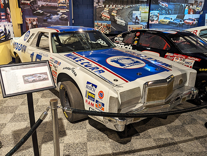 The iconic Mobil 1 paint scheme gleams under museum lights, still looking ready for one more victory lap.