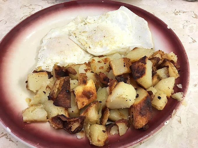 Home fries with the perfect crisp-to-soft ratio and eggs cooked exactly how you asked—diner magic that fancy brunch spots try desperately to replicate.