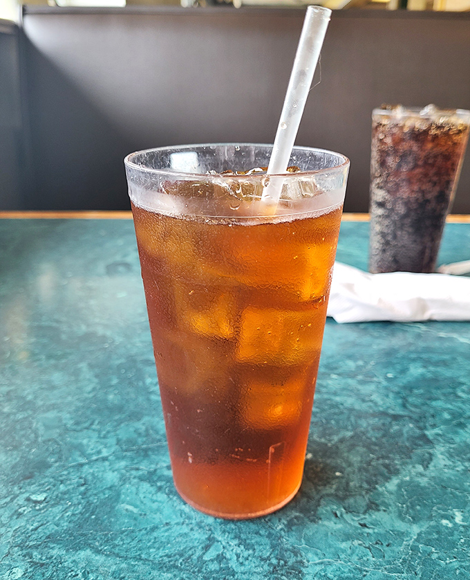 Sweet tea so perfectly brewed it makes you want to rock on a porch swing. The condensation on the glass is nature's way of applauding.