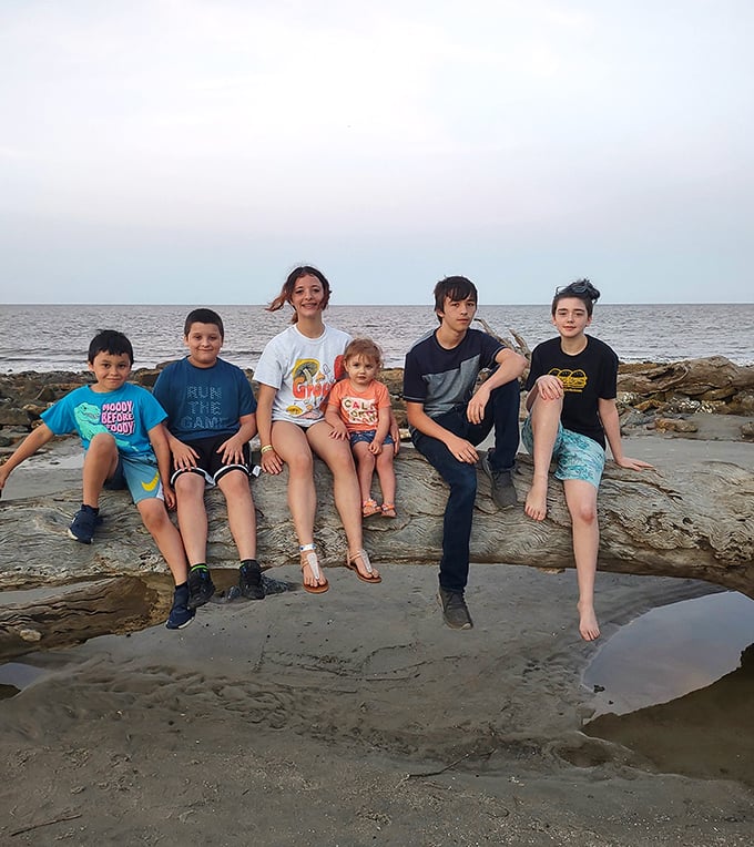 Finding the perfect perch – visitors of all ages discover that nature's playground offers the best seats for watching the Atlantic roll in.