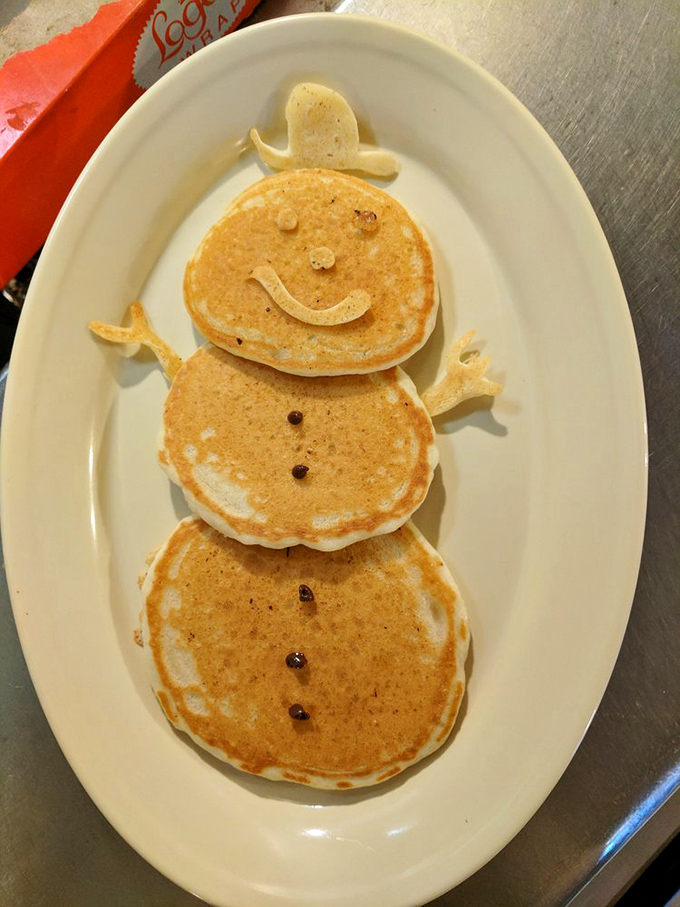 Someone turned pancakes into art – a smiling stack that makes you feel guilty about drowning it in syrup, but you'll do it anyway.