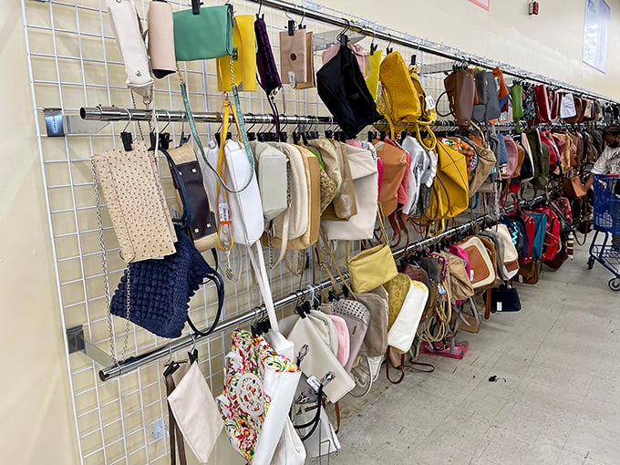 Handbag heaven! Designer lookalikes and genuine vintage purses dangle like fashionable fruit ripe for the picking.