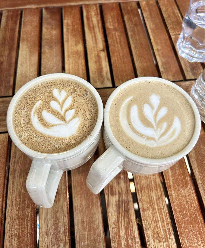 Coffee art so pretty you almost feel guilty disturbing it – almost, but then caffeine needs trump aesthetics every time.