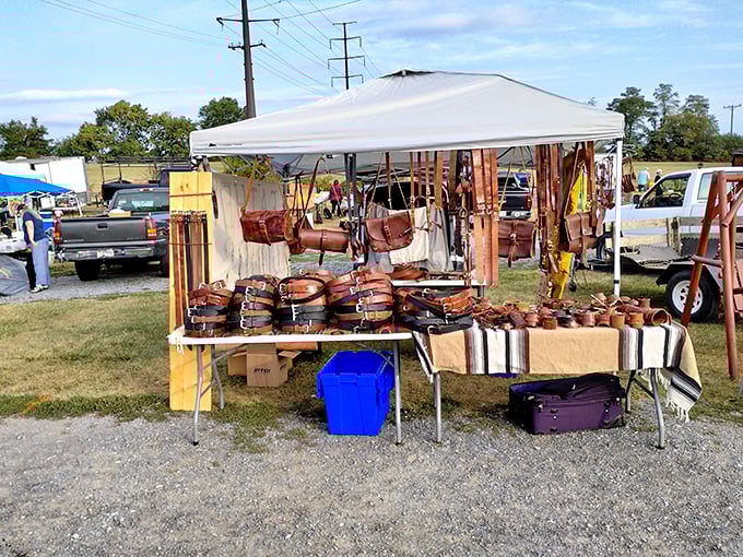 Leather goods bask in the Virginia sunshine, their earthy aroma mingling with fresh air. Handcrafted belts and bags wait patiently for their perfect match to stroll by.