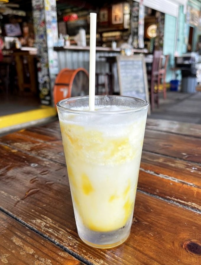 This isn't just a tropical drink—it's vacation in a glass, where mango and coconut join forces to make Monday feel like Saturday.